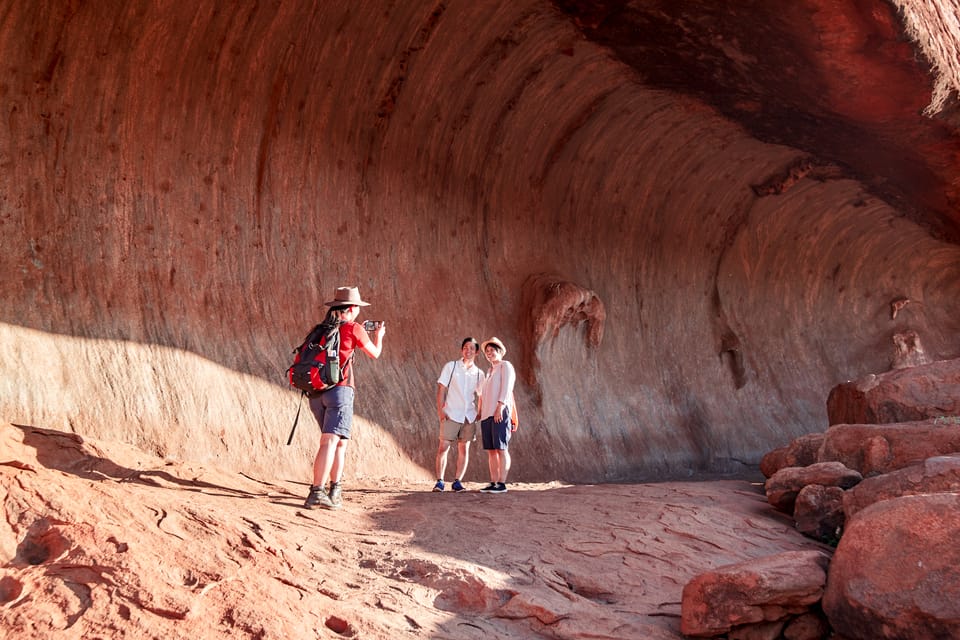 Uluru: Guided Walking Tour at Sunrise with Light Breakfast | GetYourGuide