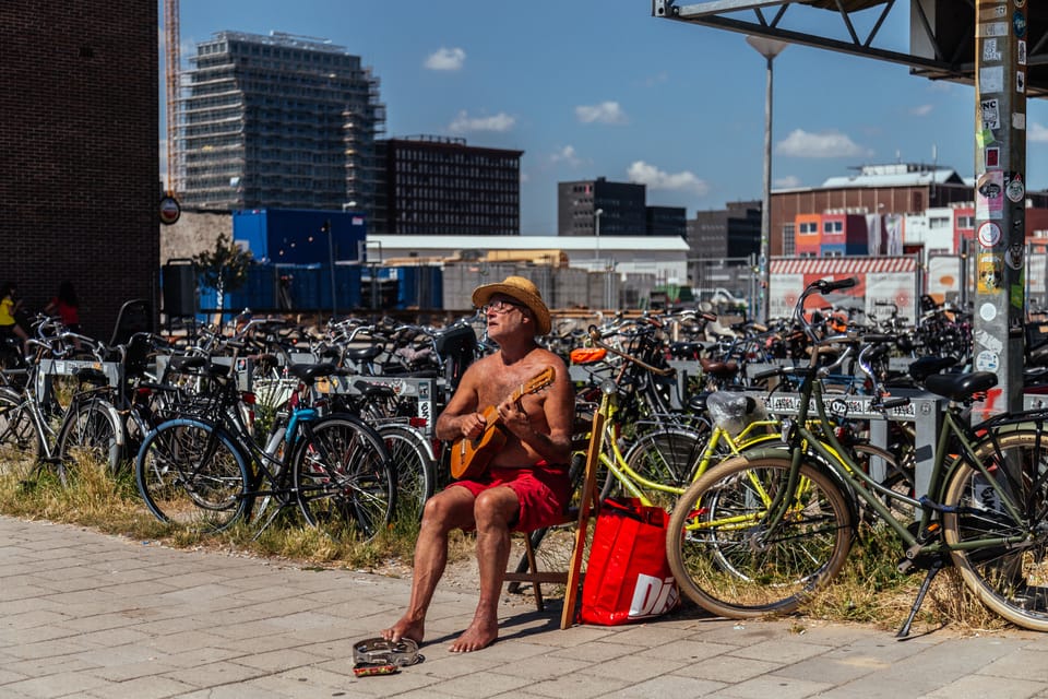 Amsterdam's Best Local Hotspots Private Tour | GetYourGuide