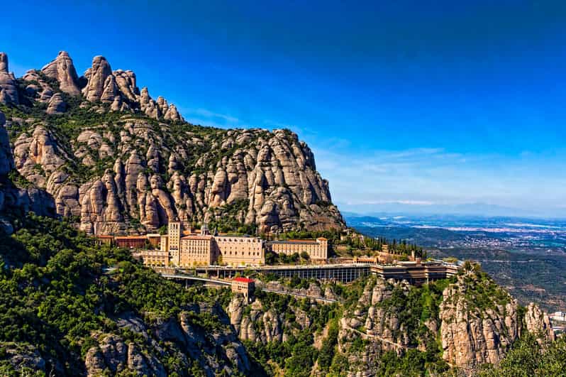 Barcelona & Montserrat: Full-Day Highlights Tour w/ Pickup | GetYourGuide