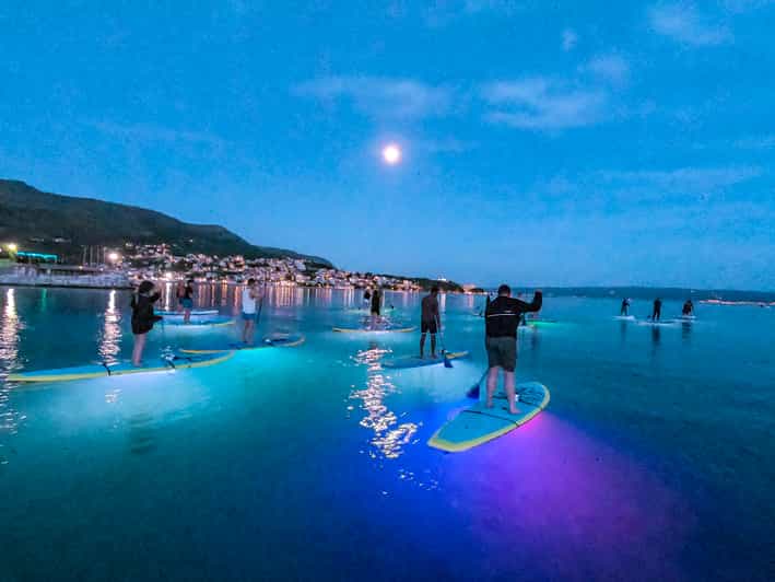 Split: Stand Up Paddleboard Night Glow Tour | GetYourGuide