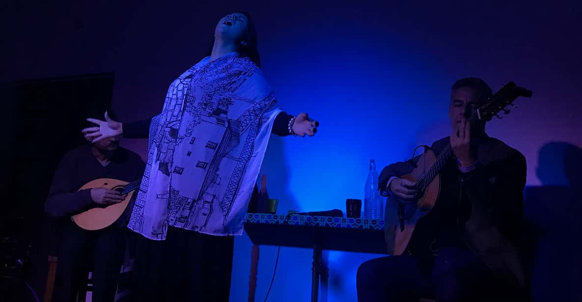 Porto: 4 Artists Fado na Baixa Performance with Port Wine | GetYourGuide