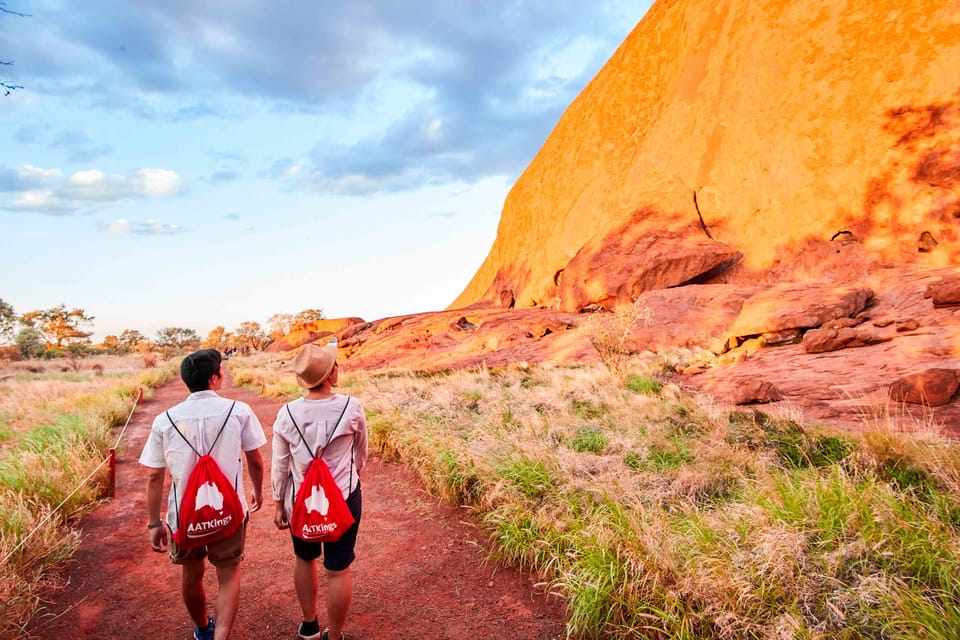 Uluru: Guided Walking Tour at Sunrise with Light Breakfast | GetYourGuide