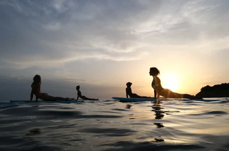 Pula: Stand-Up Paddleboard Yoga Classes at Morning & Sunset | GetYourGuide