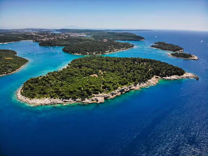 Pula: SUP Sunset Tour around Verudela Islands | GetYourGuide