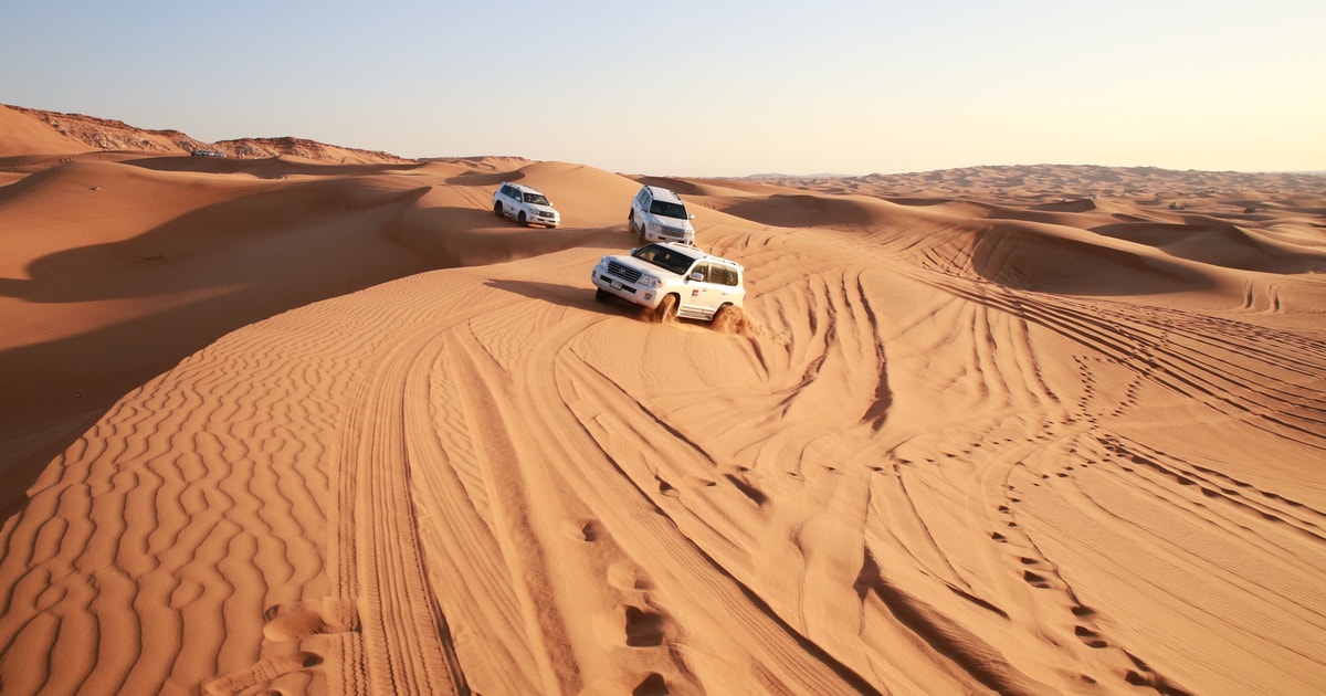 Dubái: safari por las dunas rojas con quad, sandboard y camellos ...
