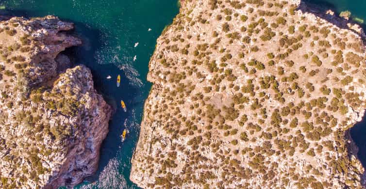 Discover the Grottos and Caves in a SUP Guided Tour | GetYourGuide