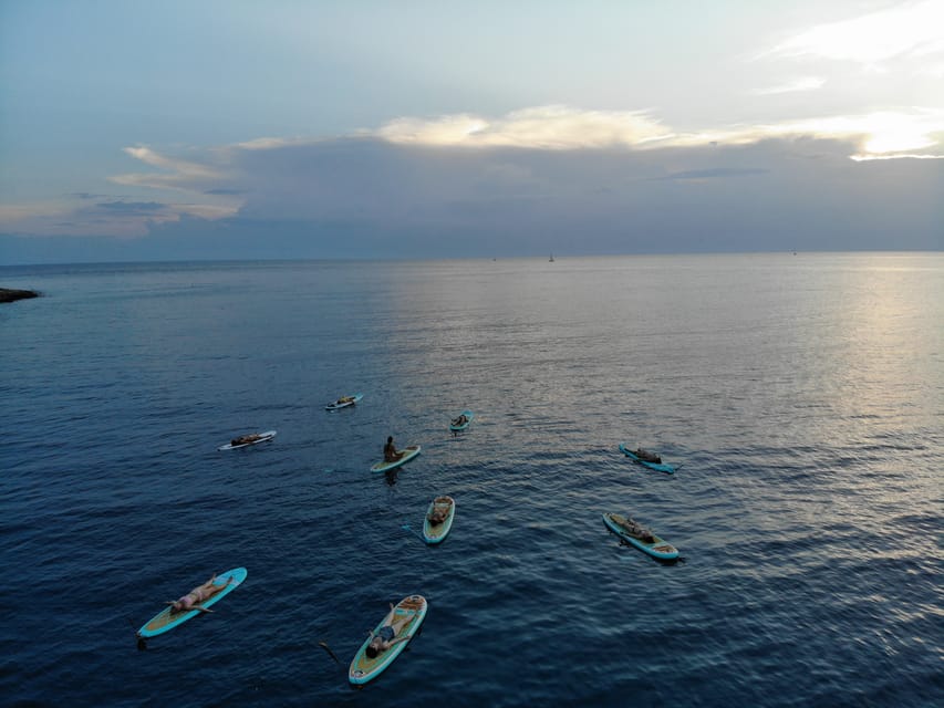 Pula: Stand-Up Paddleboard Yoga Classes at Morning & Sunset | GetYourGuide