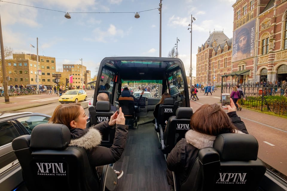 Amsterdam: Panoramic Sightseeing Tour with Audioguide | GetYourGuide
