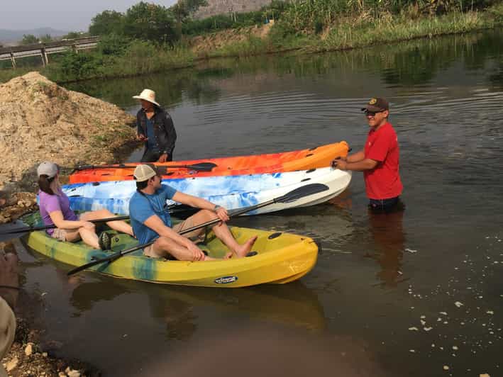 4 Experiences. Sticky waterfalls-Kayaking- Cycling & temple | GetYourGuide