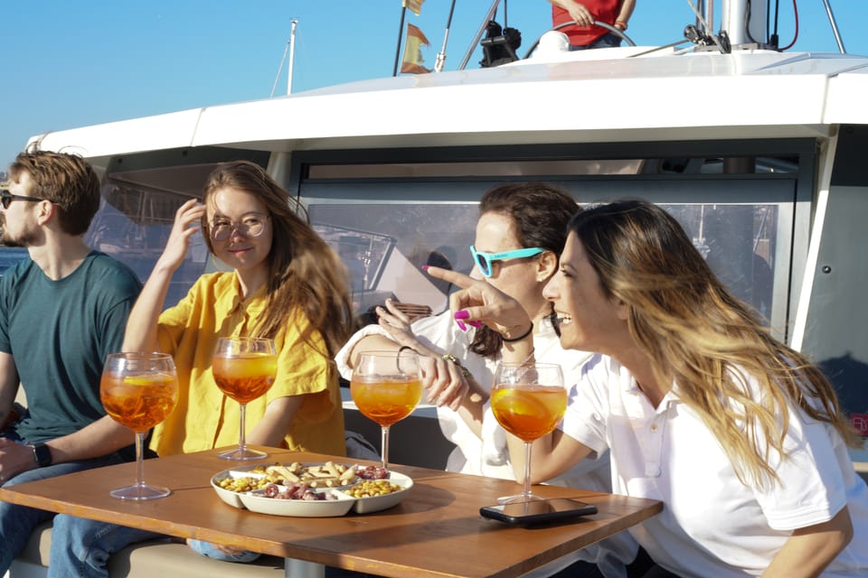 Barcelona: Lunch or Dinner Catamaran Sailing Tour | GetYourGuide