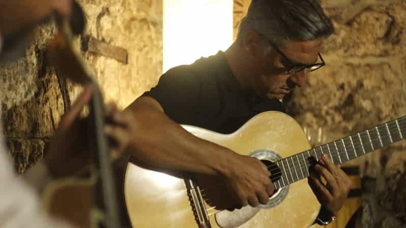 Porto: Live Fado Show with Glass of Port Wine | GetYourGuide