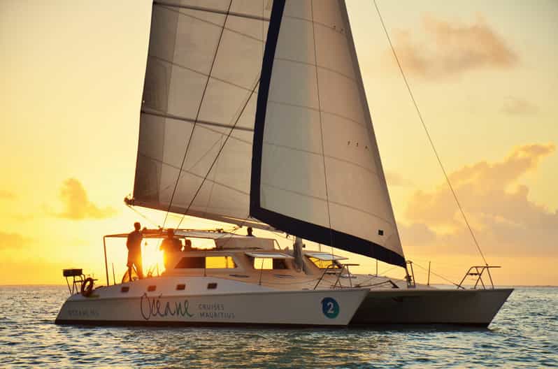 Ile aux Benitiers : Private Sunset dinner catamaran cruise | GetYourGuide