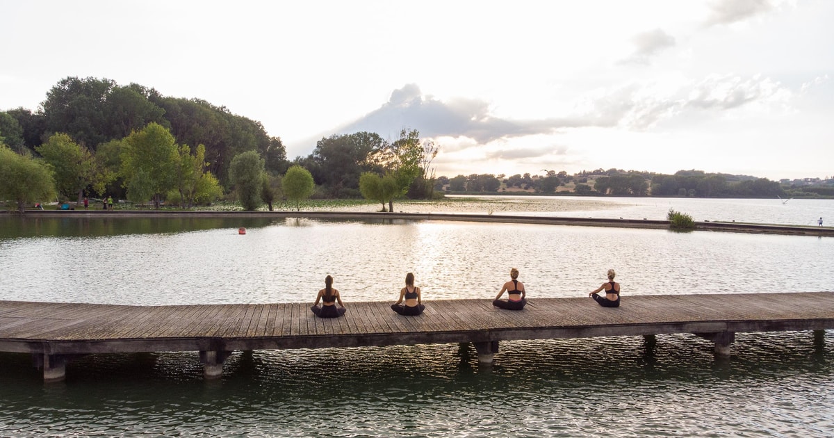Chiusi: Yoga Lesson and Picnic on the Shore of Chiusi Lake | GetYourGuide