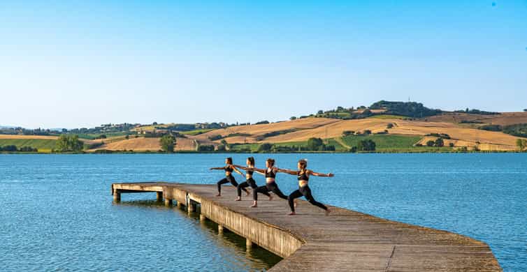 Chiusi: Yoga Lesson and Picnic on the Shore of Chiusi Lake | GetYourGuide