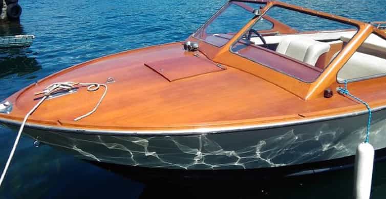 Comomeer: privétour met houten boot | GetYourGuide