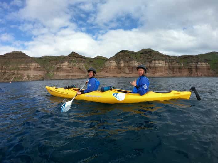 Santorini: Sea Caves Kayak Trip with Snorkeling and Picnic | GetYourGuide