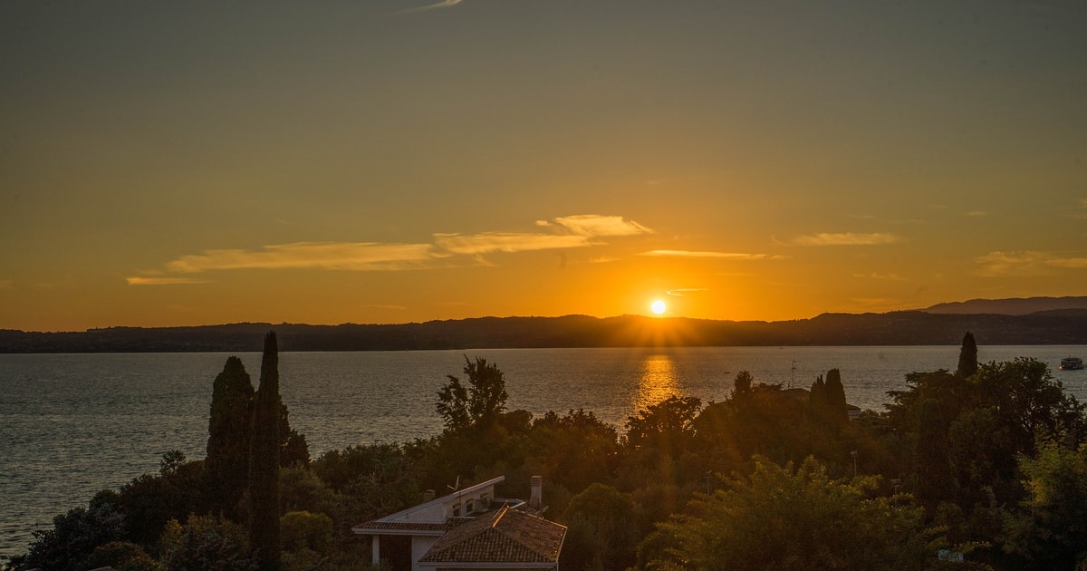 Lake Garda: Desenzano del Garda Sunset Boat Tour | GetYourGuide