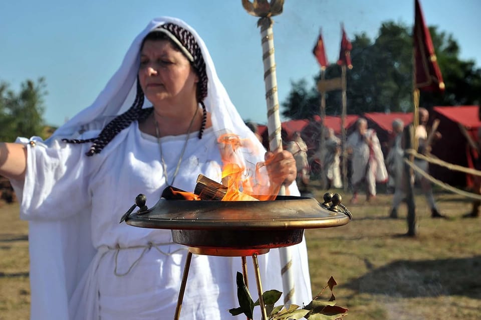 Eat under the stars like a Gladiator with Roma on fire show | GetYourGuide