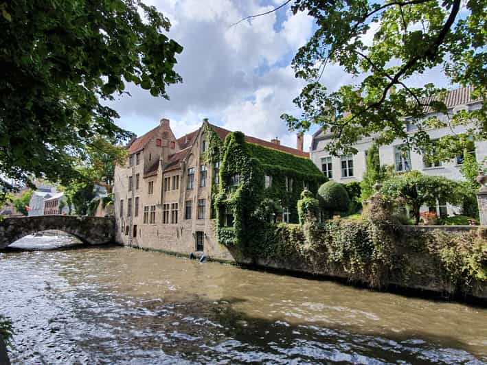 Bruges: Boat Cruise and Guided Walking Tour | GetYourGuide