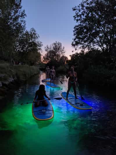 Split: Stand Up Paddleboard Night Glow Tour | GetYourGuide