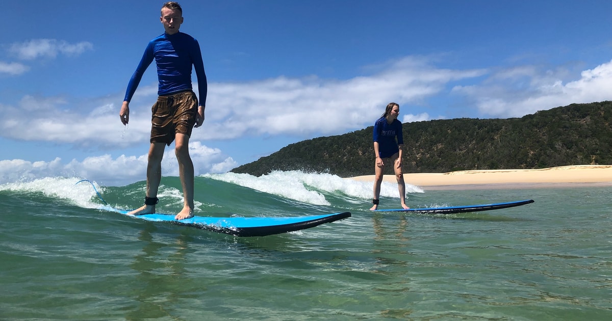 Rainbow Beach: 4WD Beach Drive Adventure and Surf Lesson | GetYourGuide