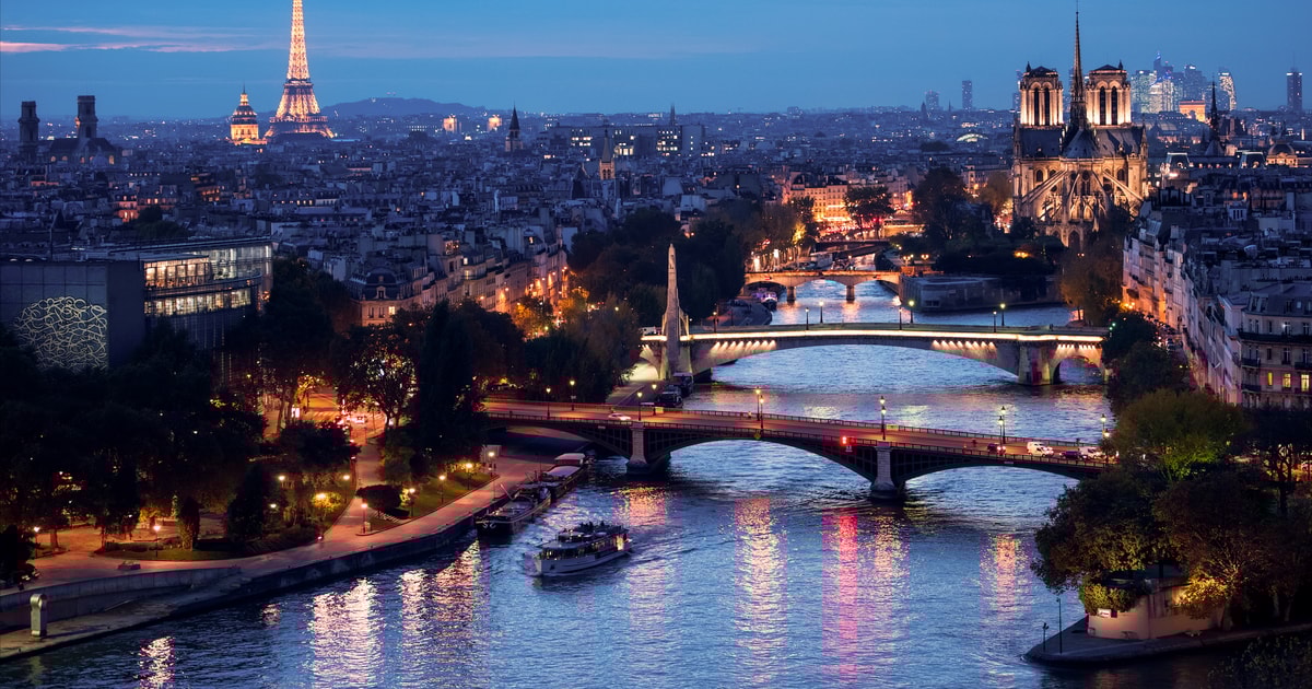 Paris: Illuminations Cruise with Drink and City Walking Tour | GetYourGuide