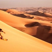 Doha: Desert Safari, Sandboarding, Camel Ride and Inland sea | GetYourGuide