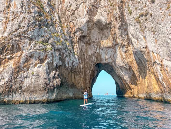 Capri: Caves and Beaches Stand Up Paddleboard Tour | GetYourGuide