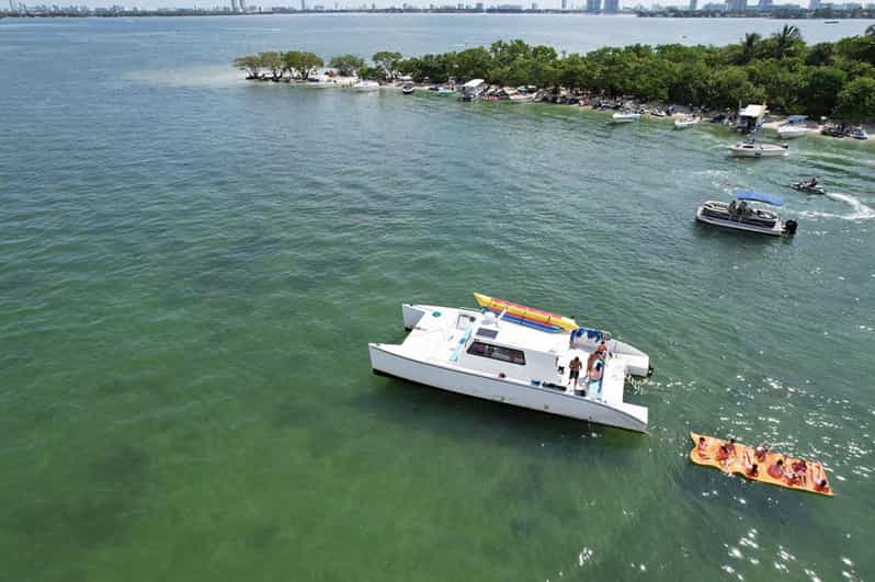 Miami: Boat Tour with Drinks, Music, Tubing, and Jet Skis | GetYourGuide