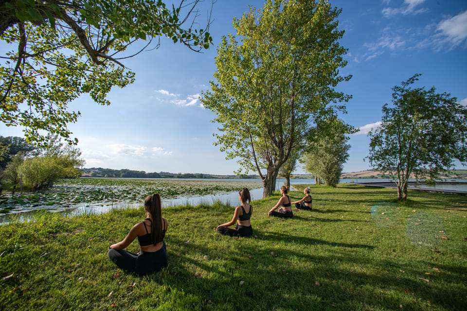 Chiusi: Yoga Lesson and Picnic on the Shore of Chiusi Lake | GetYourGuide