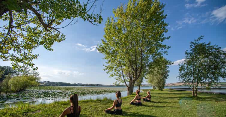 Chiusi: Yoga Lesson and Picnic on the Shore of Chiusi Lake | GetYourGuide