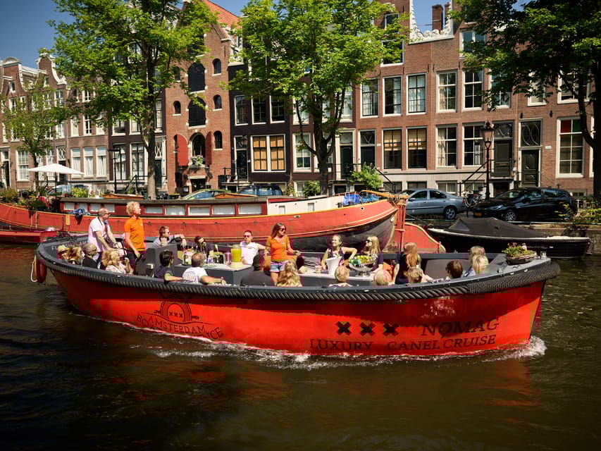 Amsterdam: Canal Belt Private Beer Boat Tour | GetYourGuide