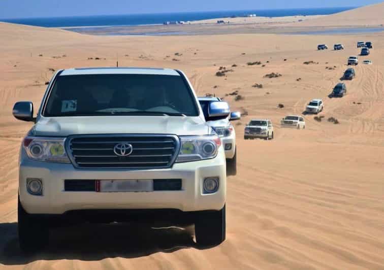 Doha: Shared Desert Safari With Dune Bashing & Sand Boarding | GetYourGuide