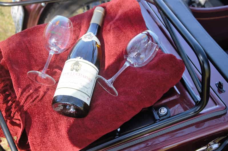Side car tour with tasting a glass of wine in the vineyard | GetYourGuide