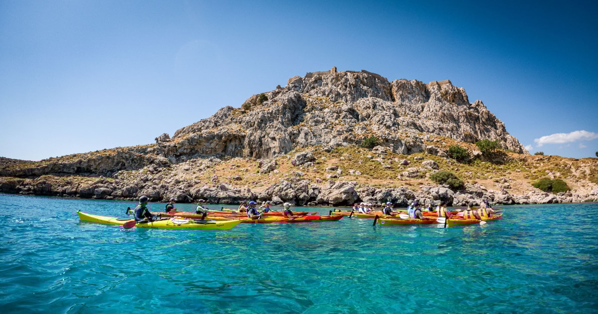 Rhodes: Sea Kayak Adventure to the Red Sand Beach | GetYourGuide