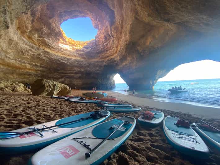 Benagil: Benagil Cave Stand Up PaddleBoard Tour at Sunrise | GetYourGuide