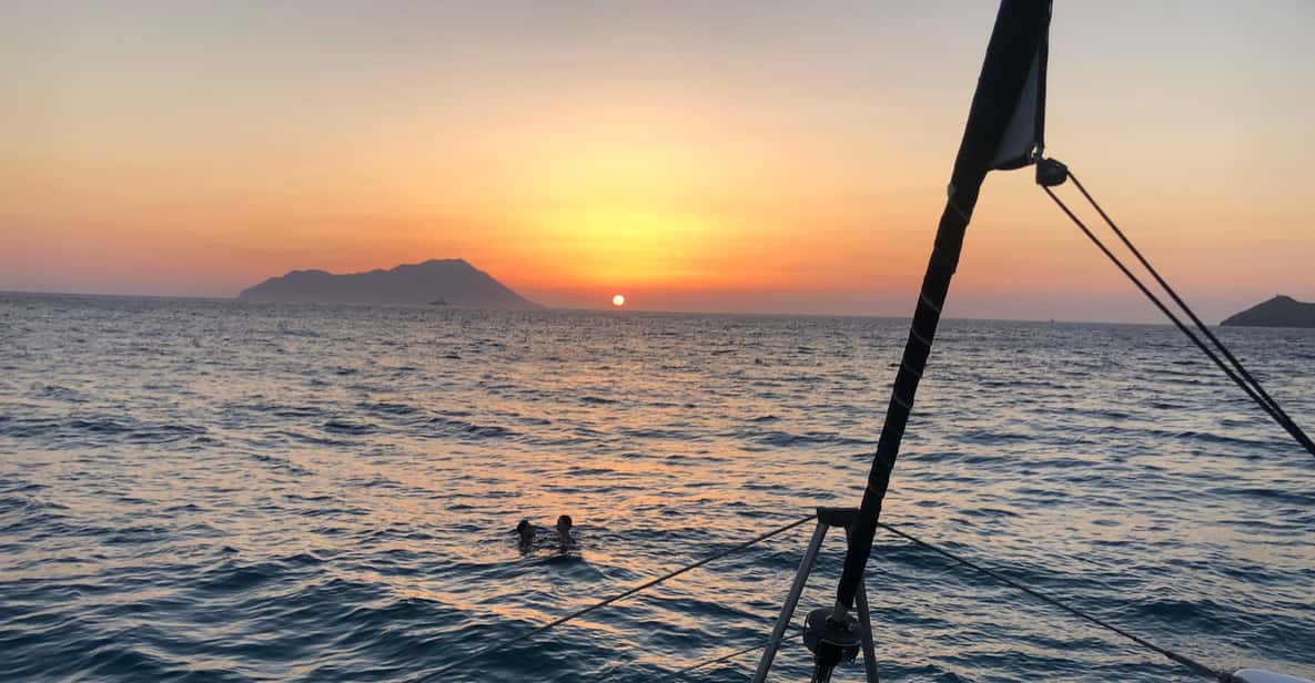 Milos: Sunset Catamaran Cruise with Kleftiko Visit | GetYourGuide