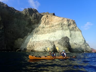Santorini: South Sea Kayaking Tour with Sea Caves and Picnic | GetYourGuide