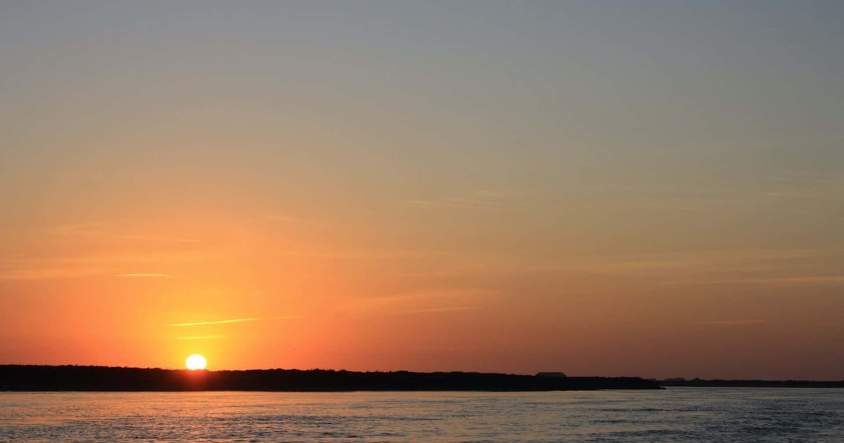 Faro: Ria Formosa Guided Sunset Tour by Catamaran | GetYourGuide