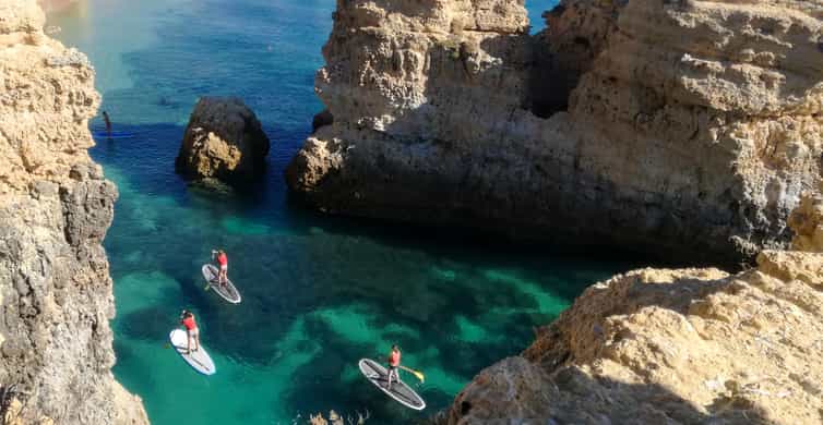 Albufeira: Stand-Up Paddle Caves and private beaches Tour | GetYourGuide