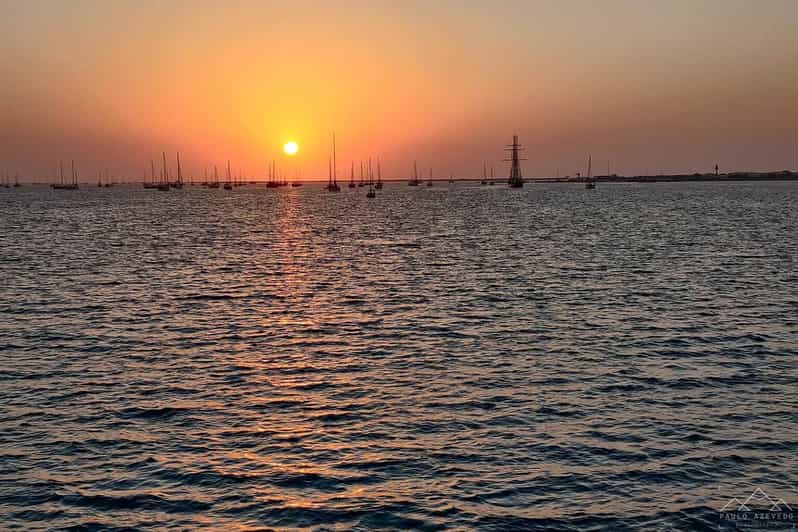 Faro: Ria Formosa Guided Sunset Tour by Catamaran | GetYourGuide