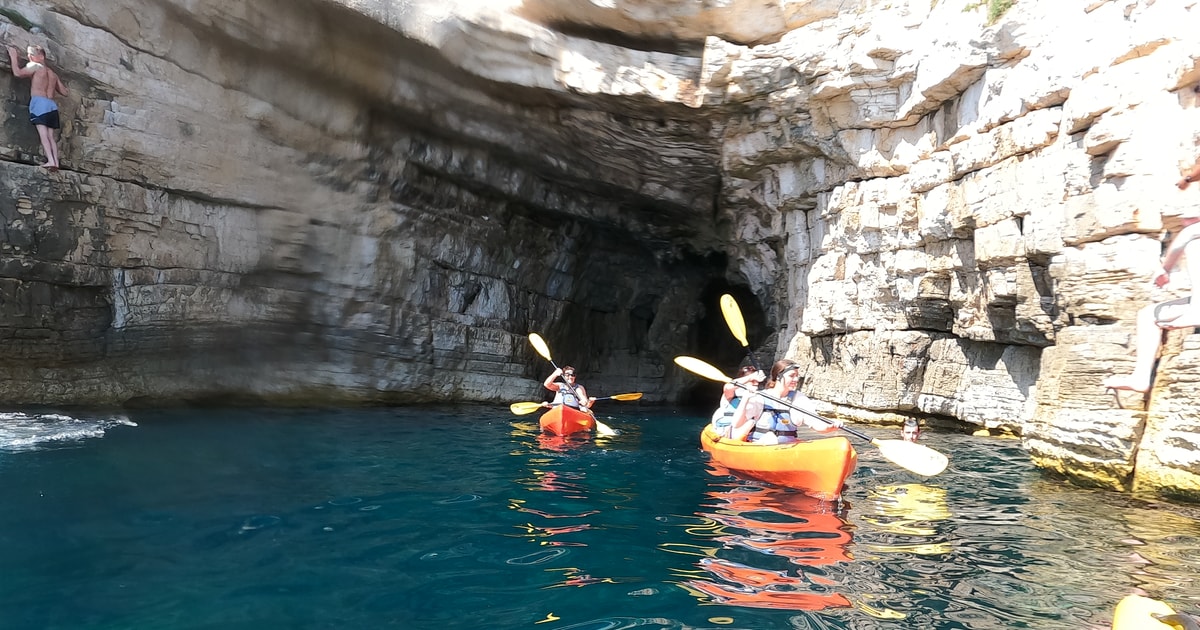 Pula: Sea Cave and Cliffs Guided Kayak Tour in Pula | GetYourGuide