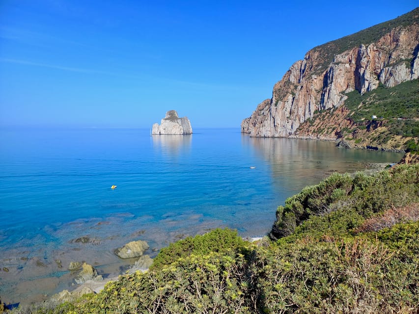 Iglesias: Guided Walking Tour of Porto Flavia & Masua Beach | GetYourGuide