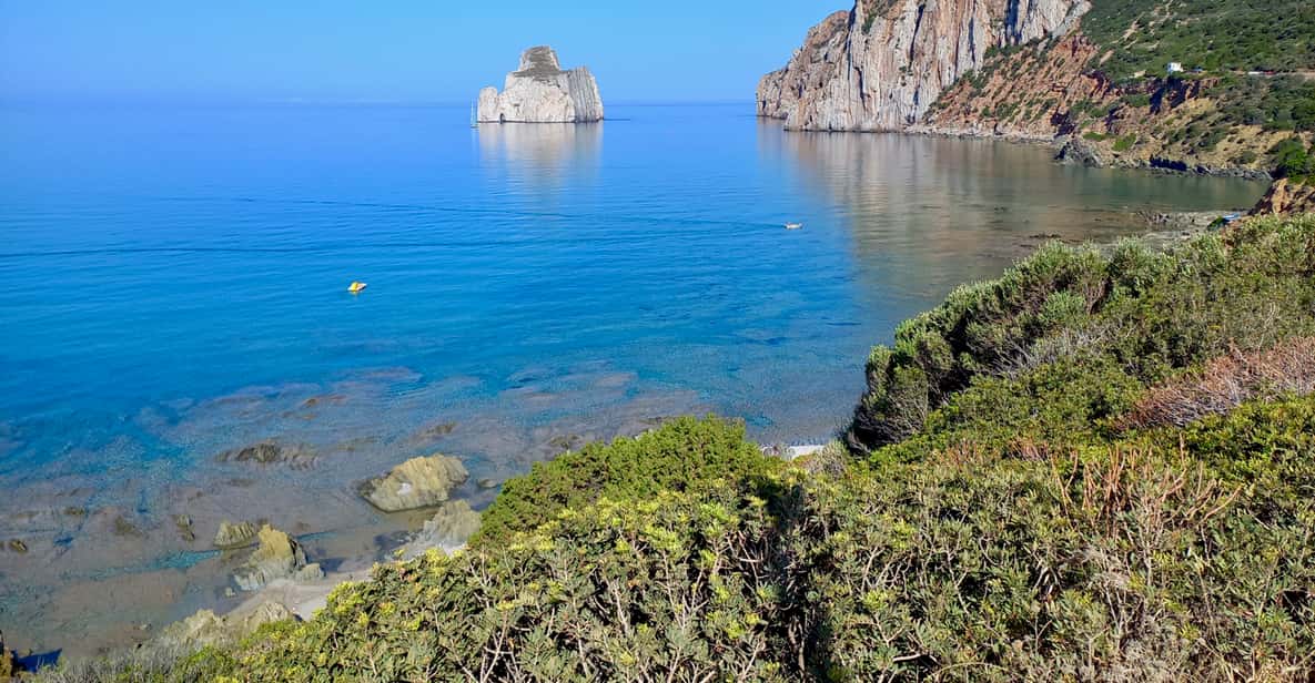 Iglesias: Guided Walking Tour of Porto Flavia & Masua Beach | GetYourGuide