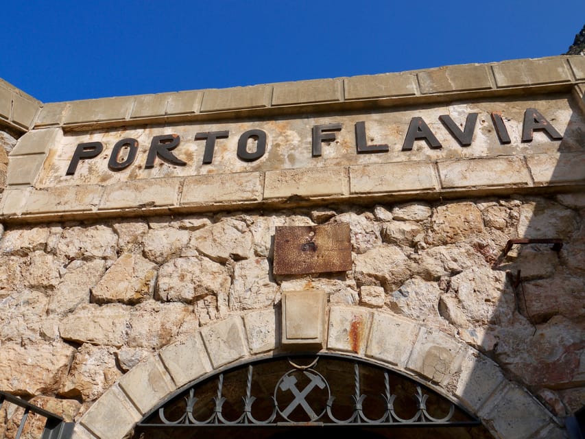 Iglesias: Guided Walking Tour of Porto Flavia & Masua Beach | GetYourGuide