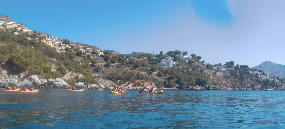 From Málaga: Cliffs of Maro-Cerro Gordo Guided Kayaking Tour | GetYourGuide