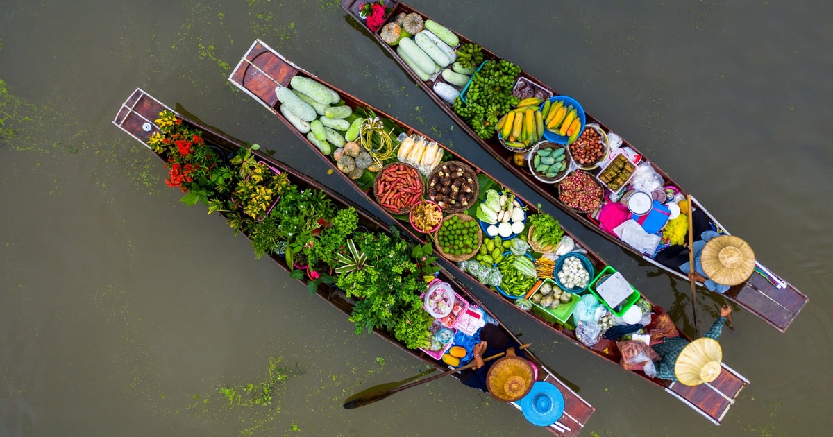 From Bangkok: Maeklong Railway and Floating Market Food Tour | GetYourGuide
