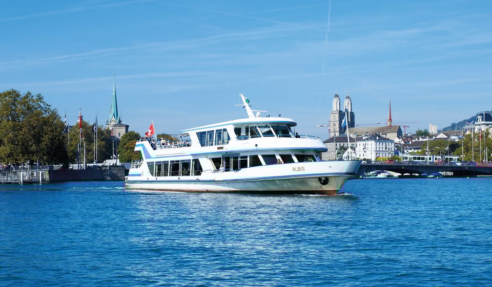 Zurich: City Bus Tour with Audio Guide and Lake Cruise | GetYourGuide