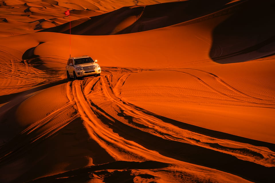 Doha: Desert Safari, Dune Bashing, Sandboarding, Camel Ride | GetYourGuide