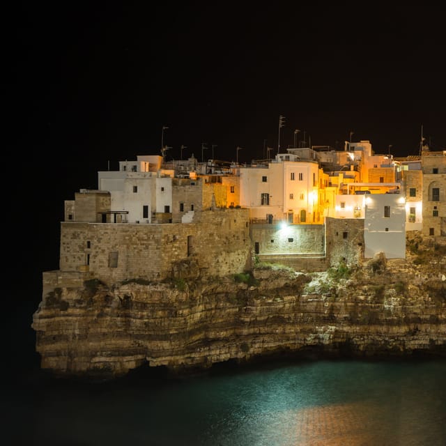 Moonlight Boat Tour to the Polignano a Mare caves | GetYourGuide